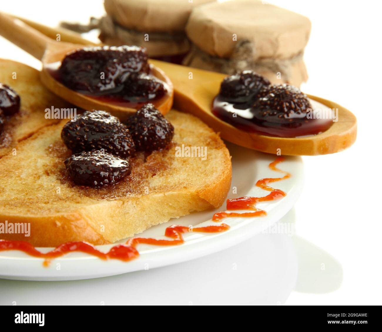 White bread toast with jam on plate, isolated on white Stock Photo - Alamy