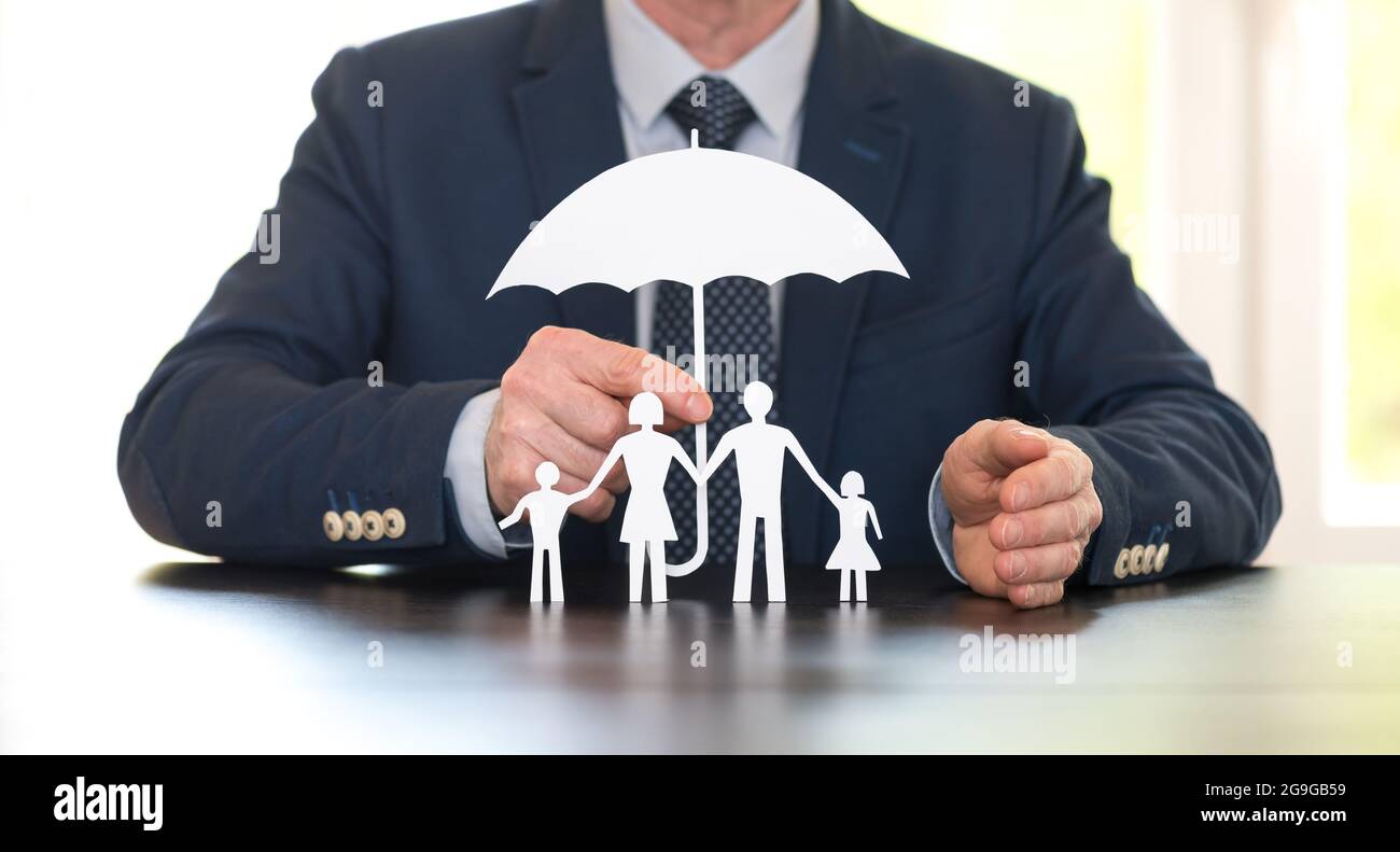 Symbol of family protection by a general agent Stock Photo - Alamy