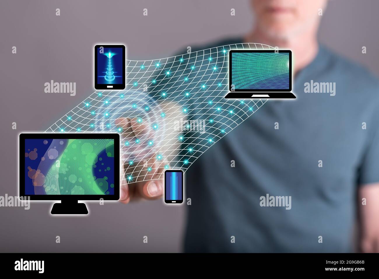 Man touching a device connection concept on a touch screen with his ...