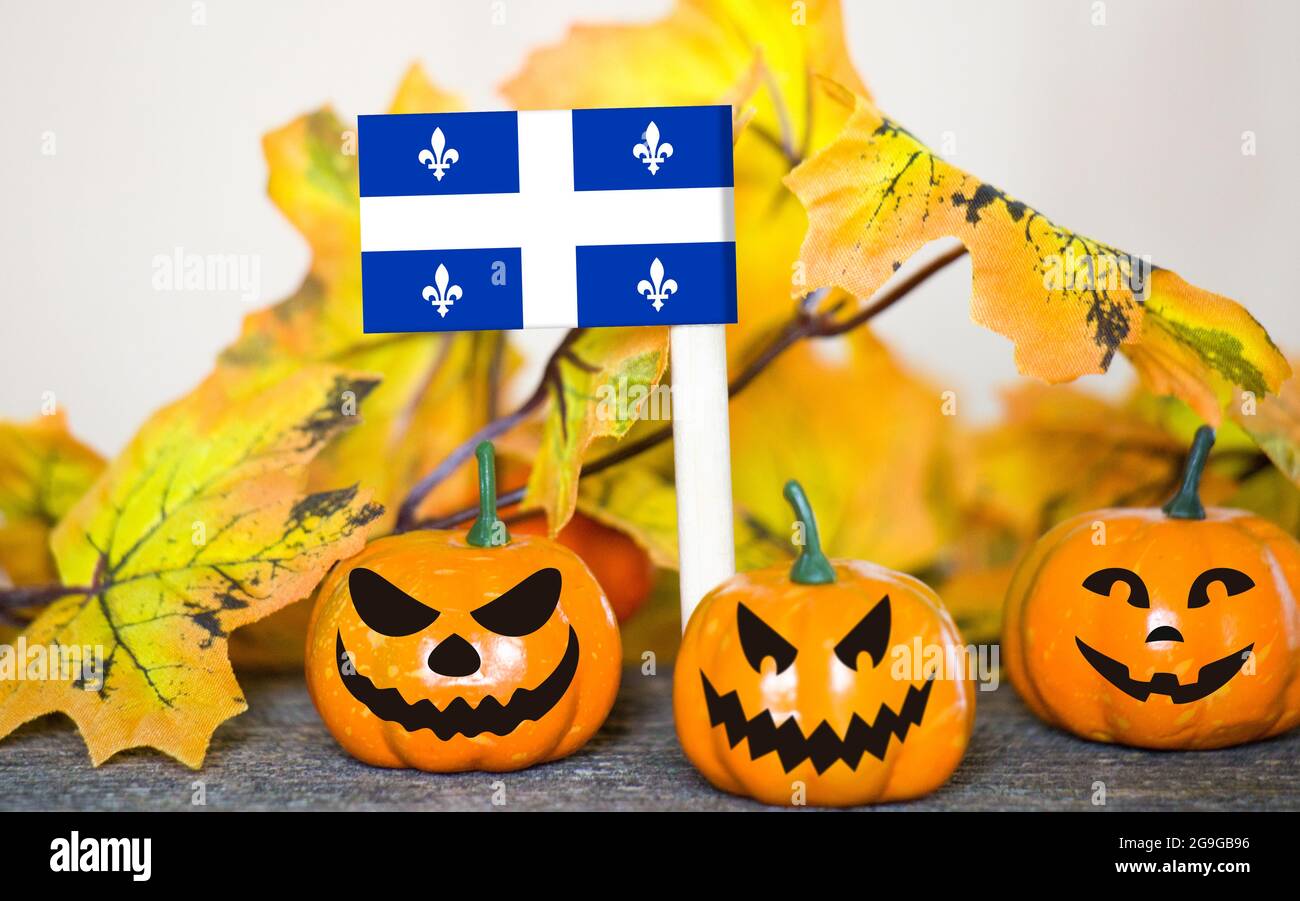 Colorful Halloween background with smiley pumpkins and toy flag of ...