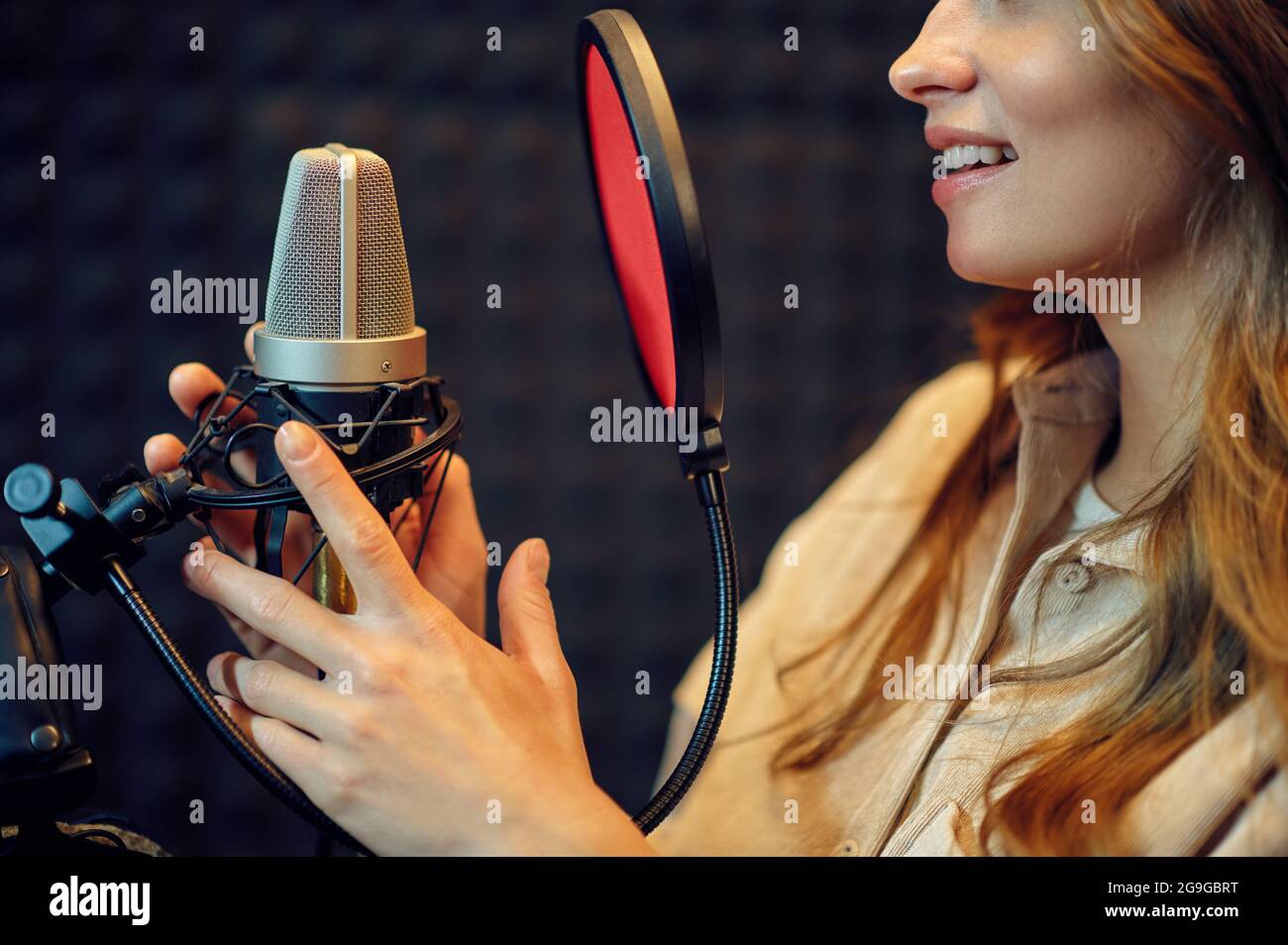 Female singer sings a song, recording studio Stock Photo - Alamy