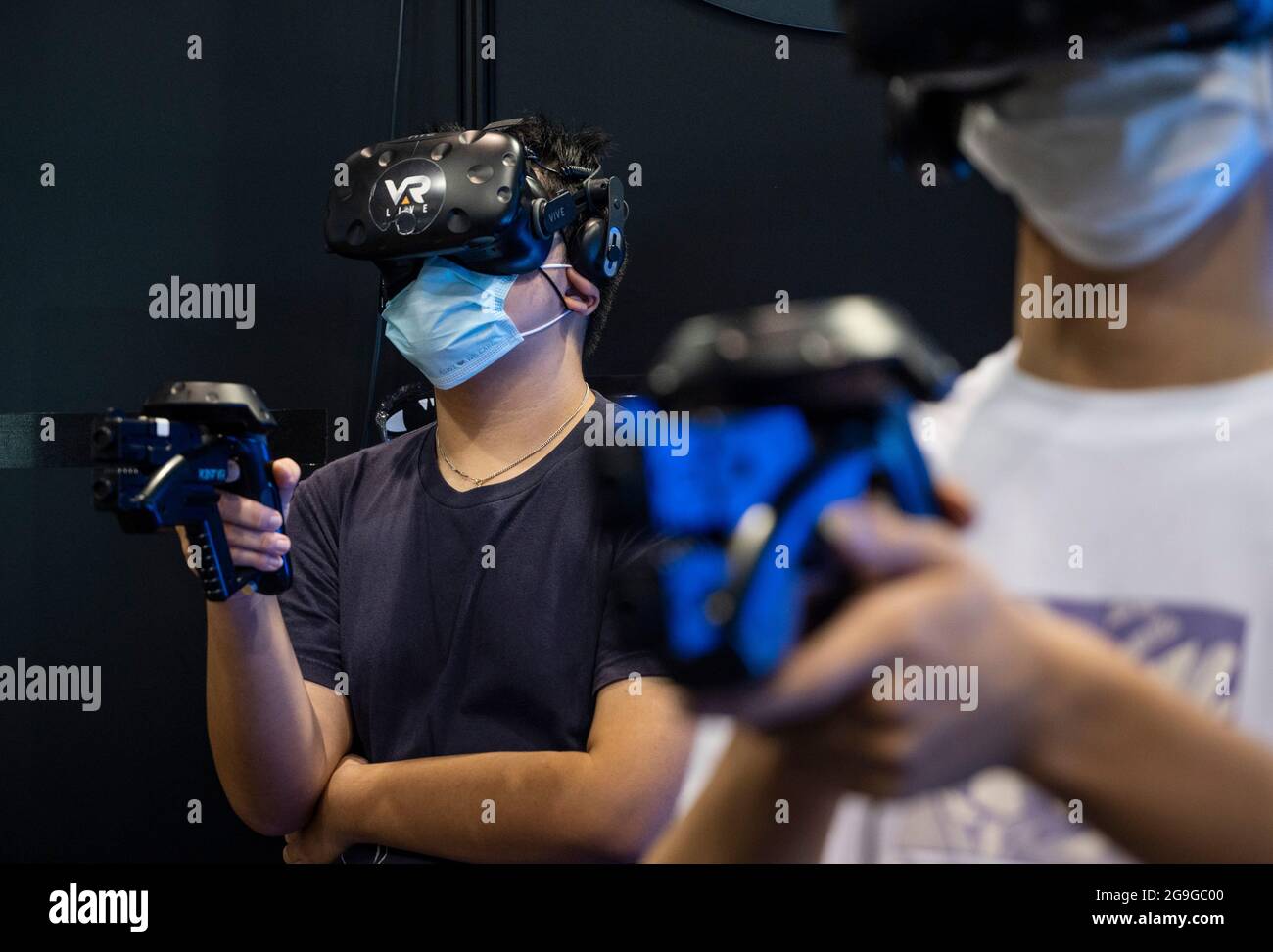 Visitors play Virtual Reality (VR) games during the Ani-com & Games ...