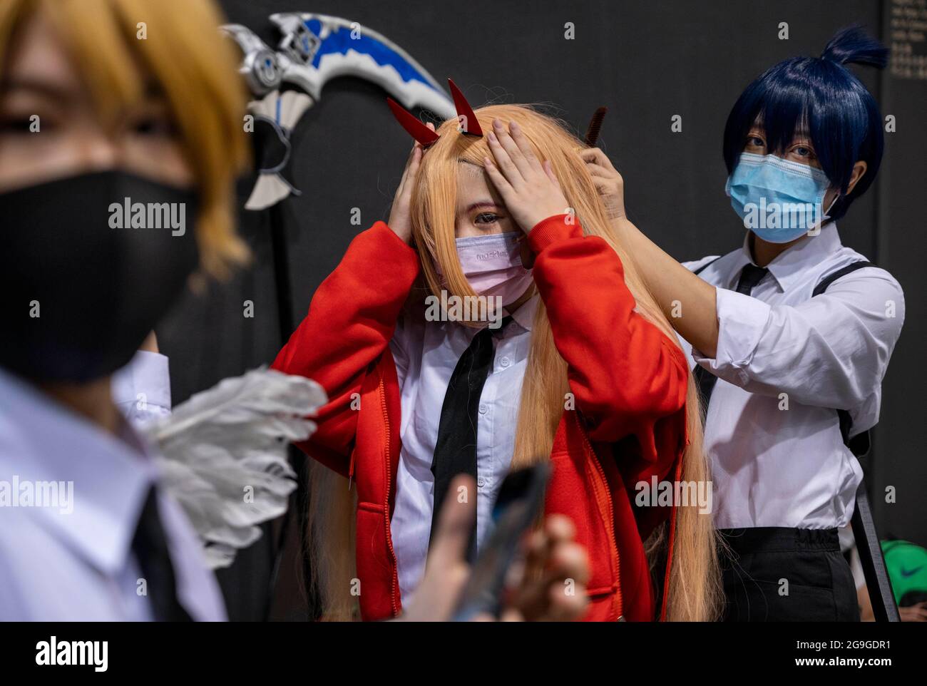Hong Kong, China. 24th July, 2021. A cosplayer is seen dressing up ...