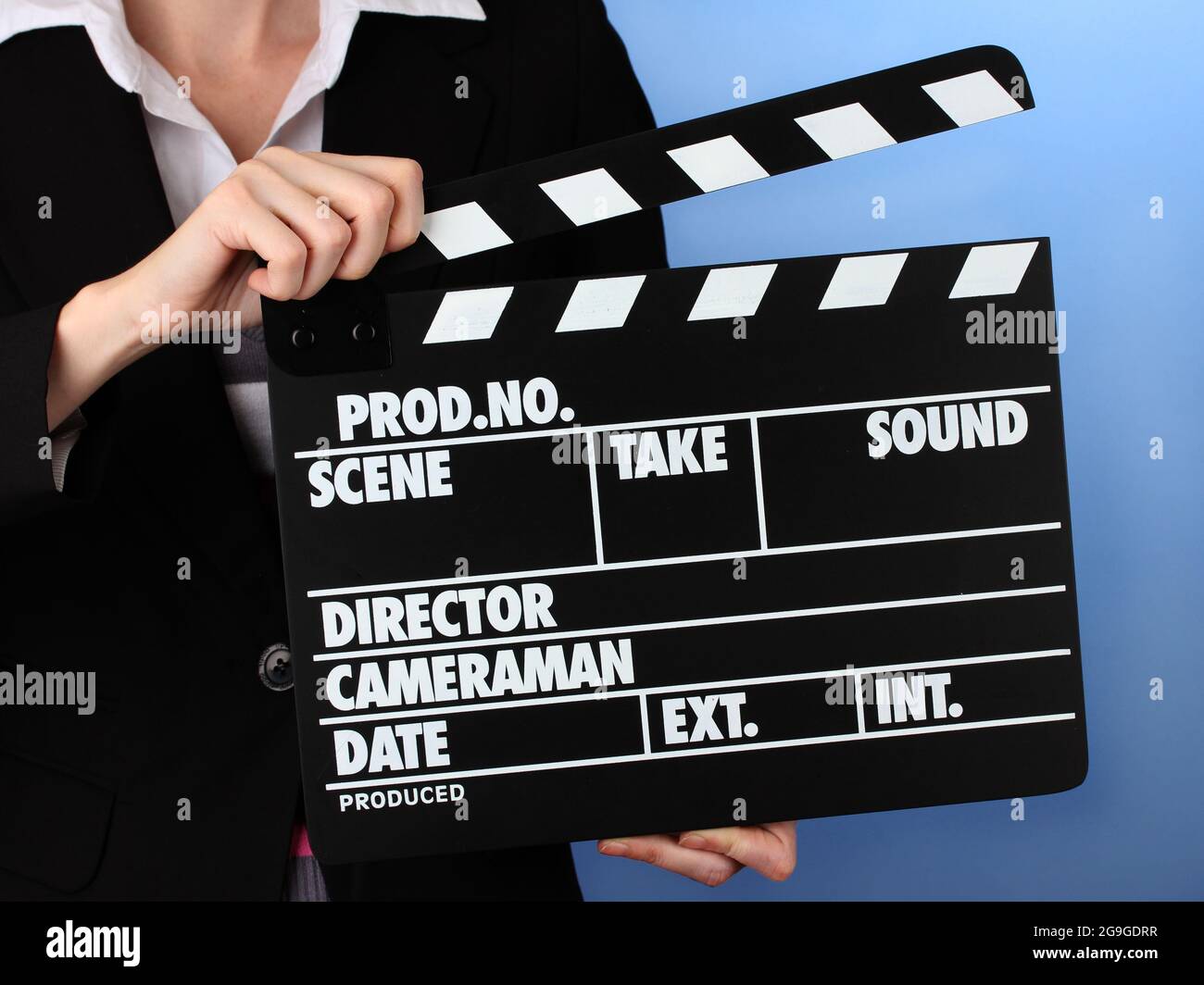 Movie production clapper board on color background Stock Photo - Alamy