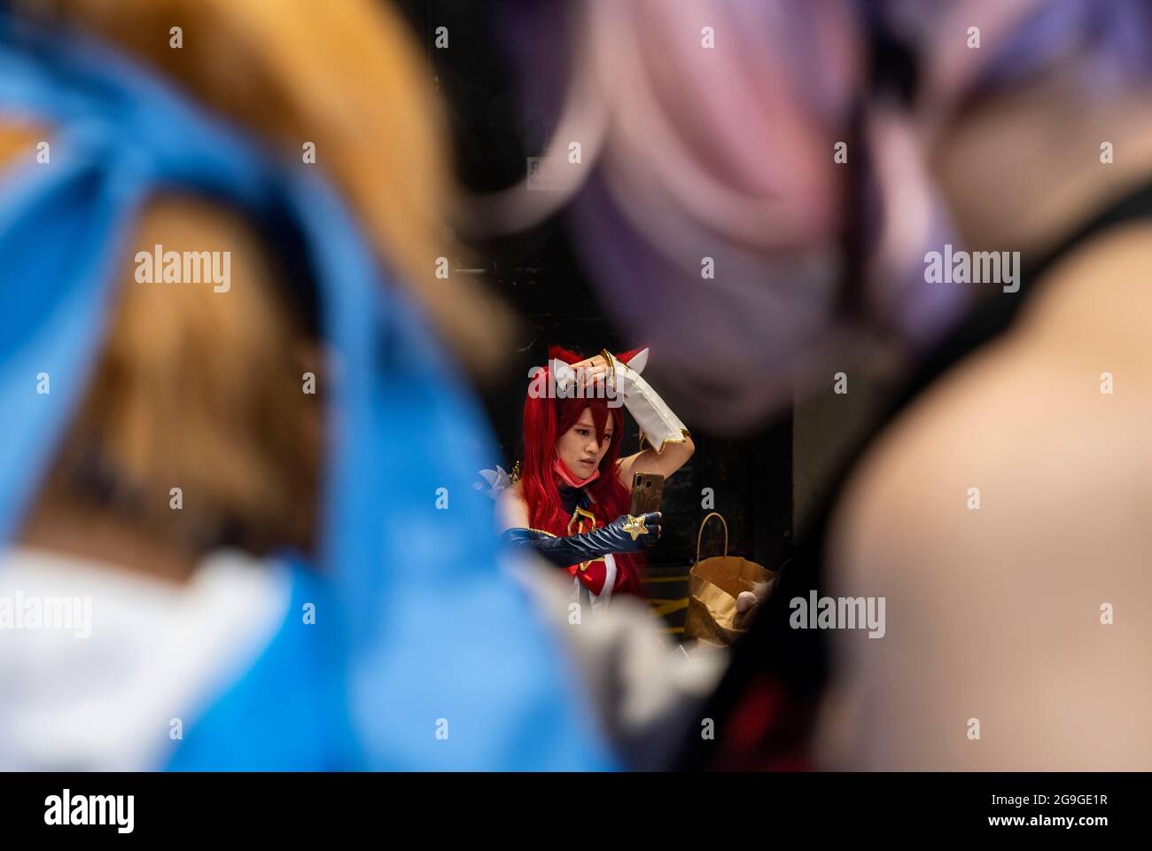 Hong Kong, China. 24th July, 2021. A cosplayer is seen dressing up ...