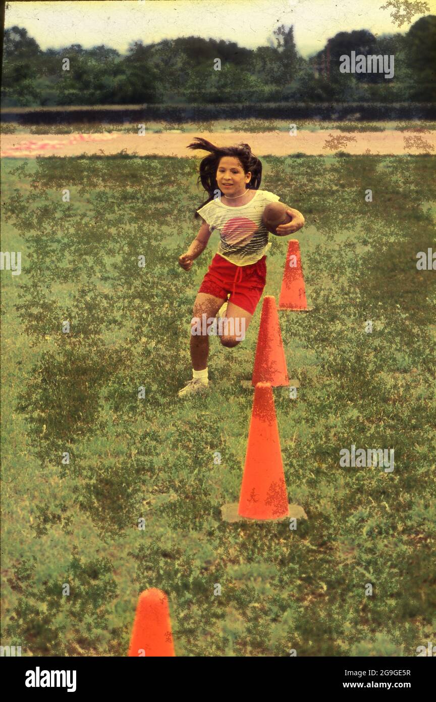 Girl weaving between obstacles hi-res stock photography and images - Alamy