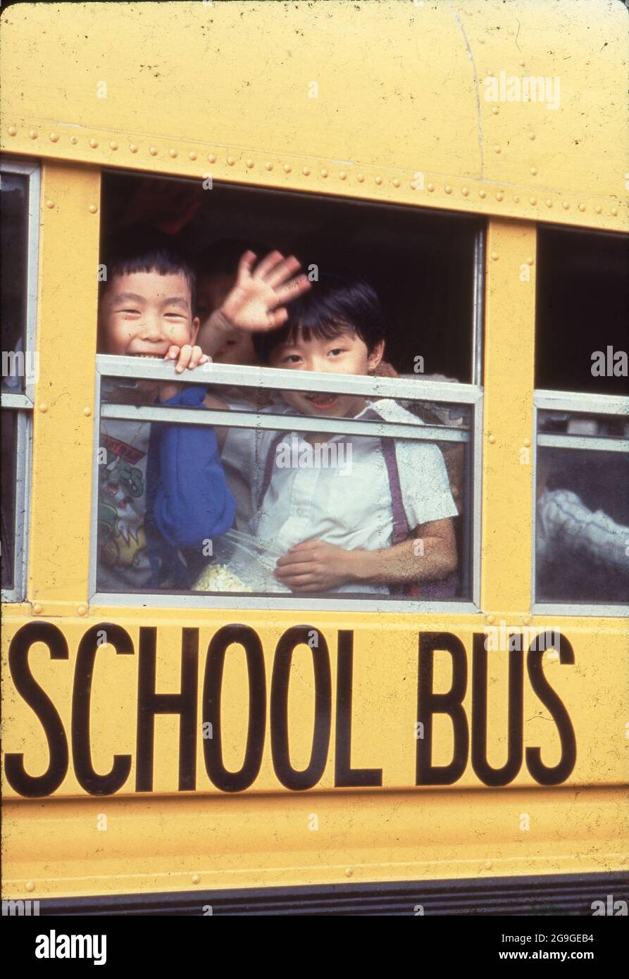 Austin, Texas USA: Public school children ride yellow school bus to ...
