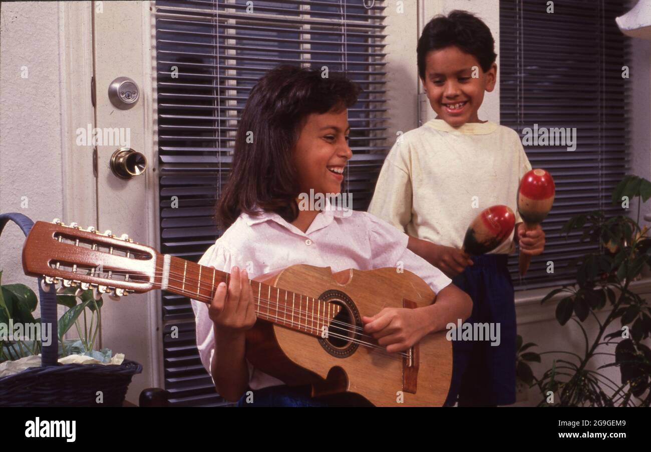Austin, Texas USA, 1989: Hispanic children playing Puerto Rican ...