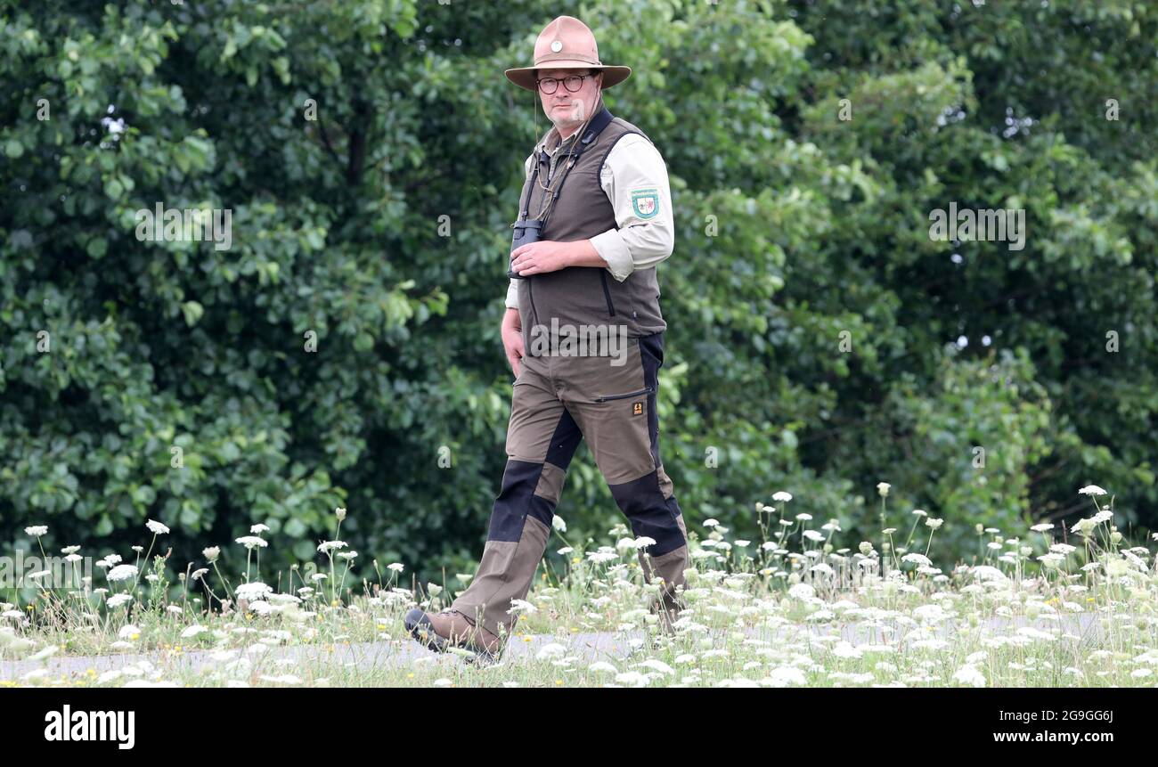 Zingst, Germany. 26th July, 2021. Carsten Wagner, ranger in the ...