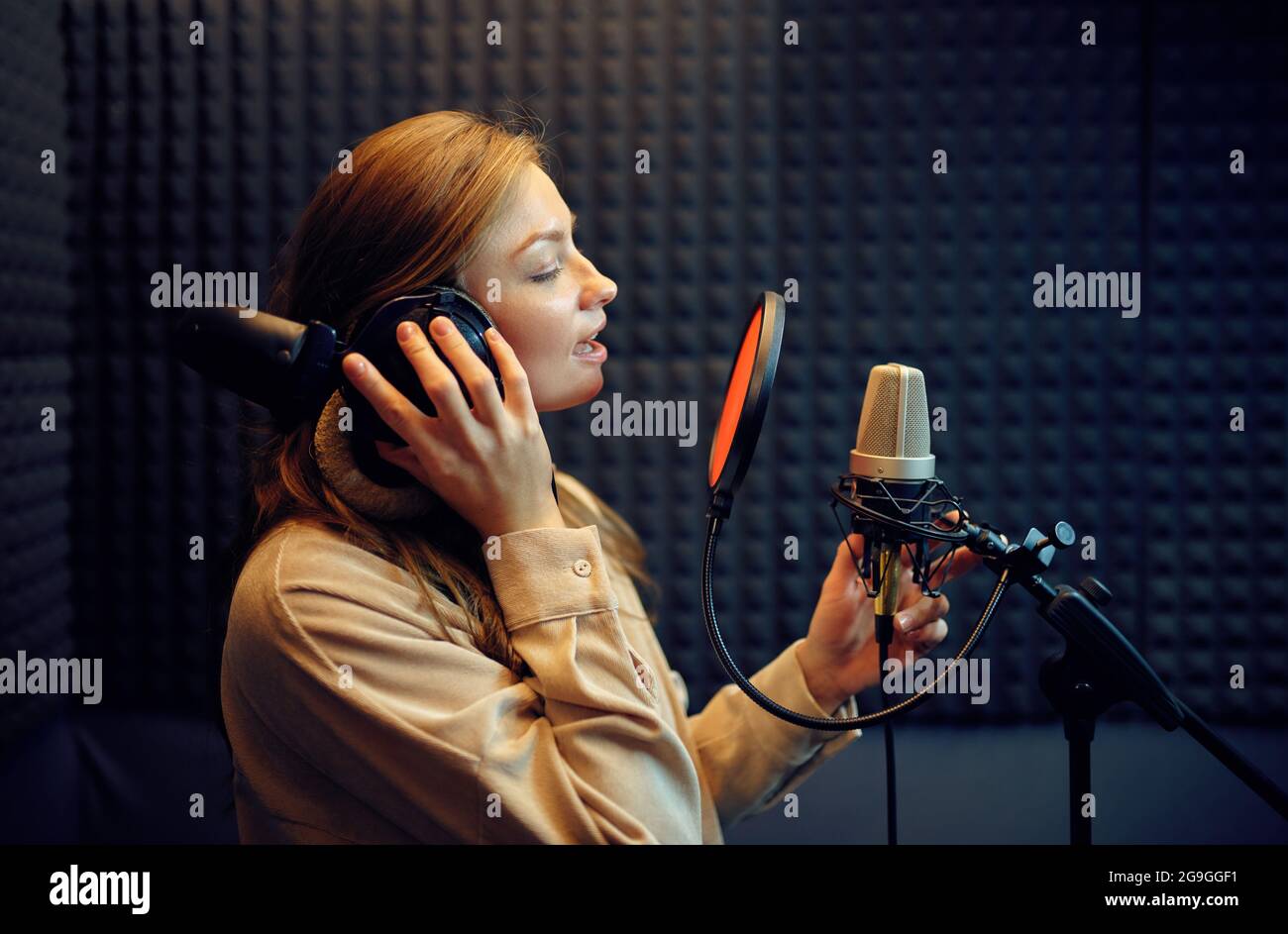 Female singer sings a song, recording studio Stock Photo - Alamy