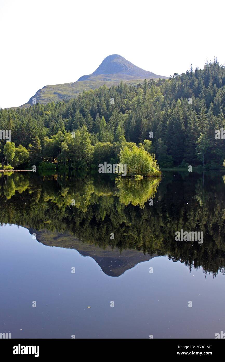 Pap of Glencoe reflections in Glencoe Lochan, Highlands, Scotland Stock Photo - Alamy