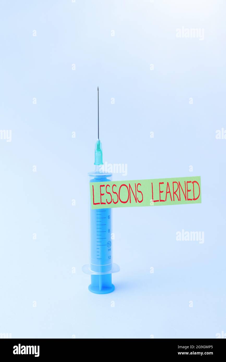 Text sign showing Lessons Learned. Concept meaning the knowledge or ... Text sign showing Lessons Learned. Concept meaning the knowledge or ...