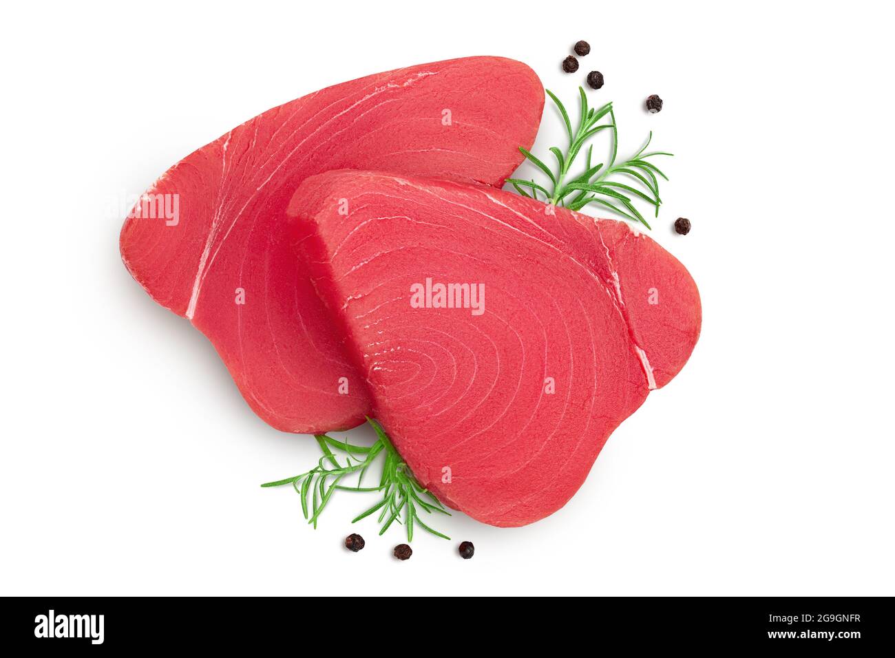 Fresh tuna fish fillet steak with rosemary and peppercorns isolated on ...