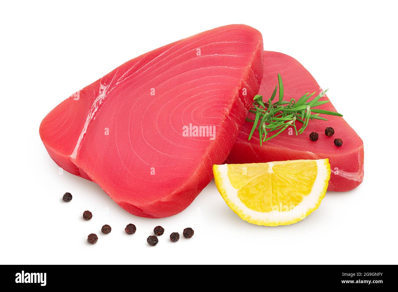 Fresh tuna fish fillet steak with rosemary, lemon and peppercorns ...