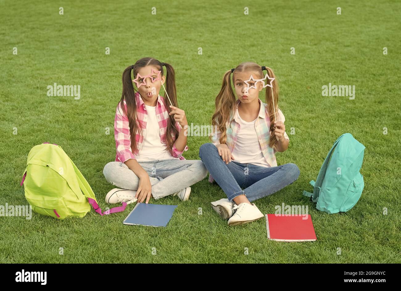 Best way to relax. two little kids with backpack. small girl play and ...