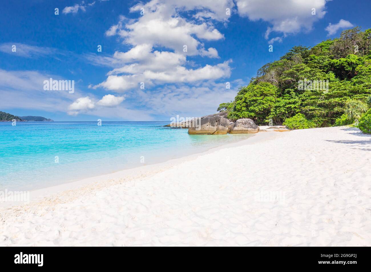 Beautiful sandy beach with wave crashing on sandy shore at Similan ...
