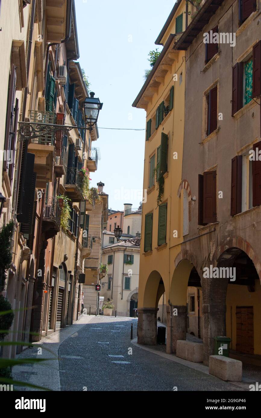 A typical narrow Italian Street in attractive small town Stock Photo ...