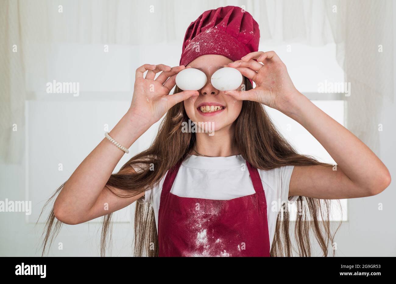 child girl cooking meal from healthy and organic products only, health ...