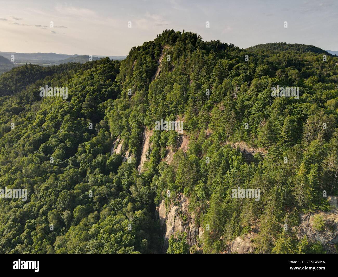 Rocky Silver Mountain covered with green trees in Quebec, Canada Stock ...