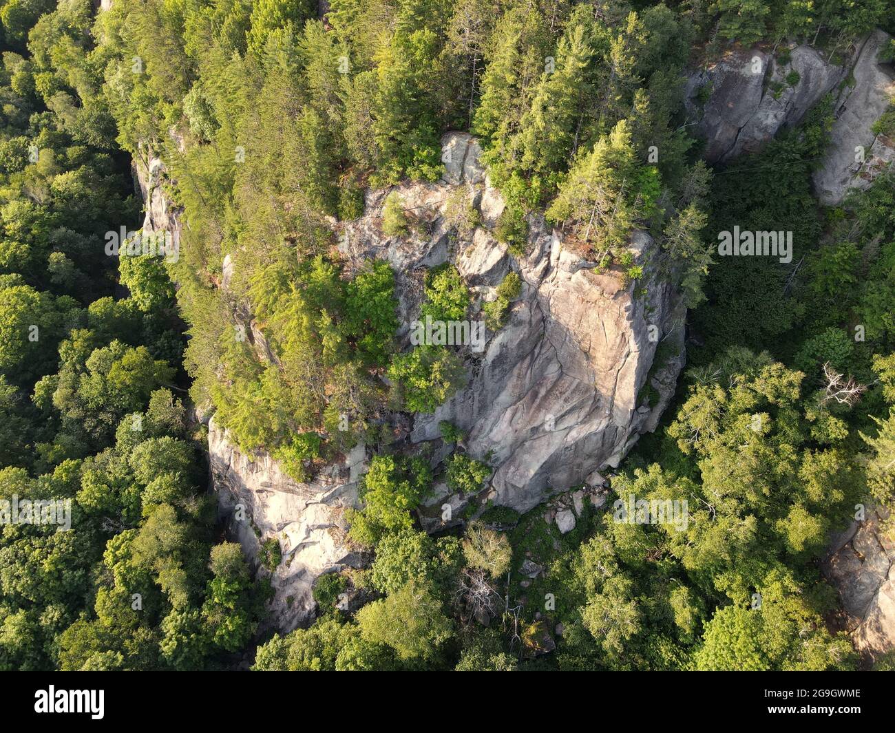 Rocky Silver Mountain covered with green trees in Quebec, Canada Stock ...