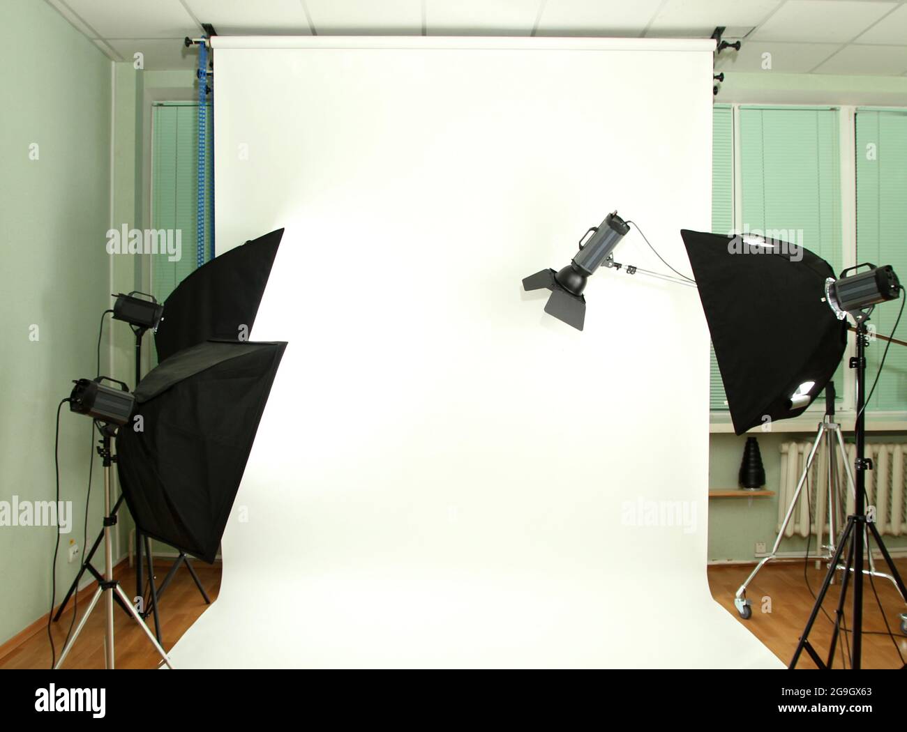 Empty photo studio with lighting equipment Stock Photo - Alamy