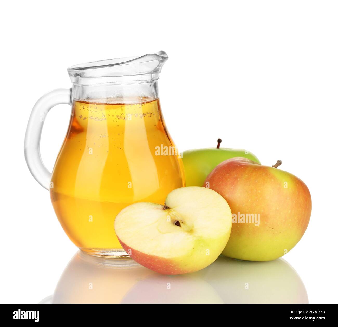 Full jug of apple juice and apple isolated on white Stock Photo - Alamy
