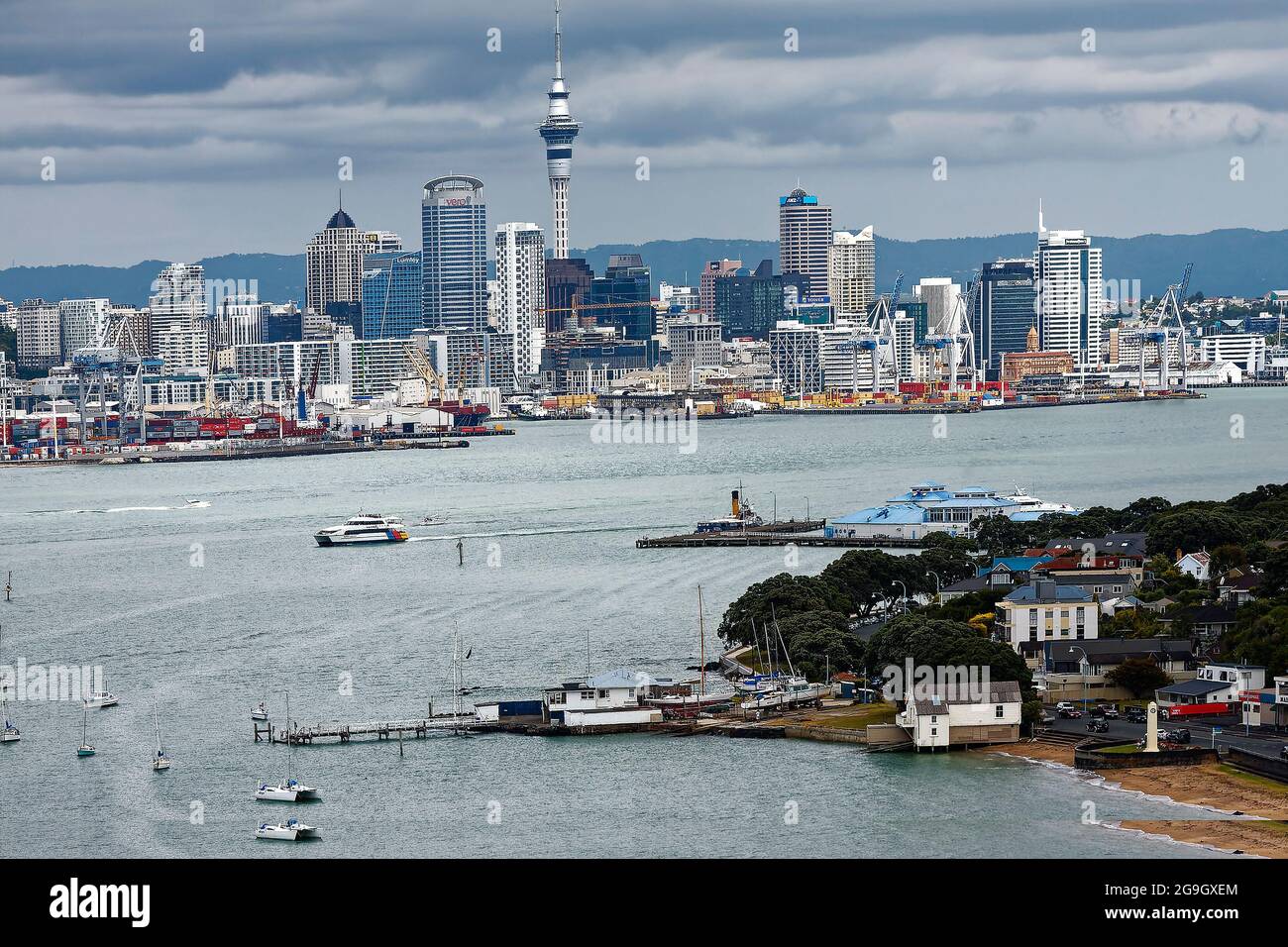 city skyline; Waitemata Harbour; high rise buildings; cranes; boats ...