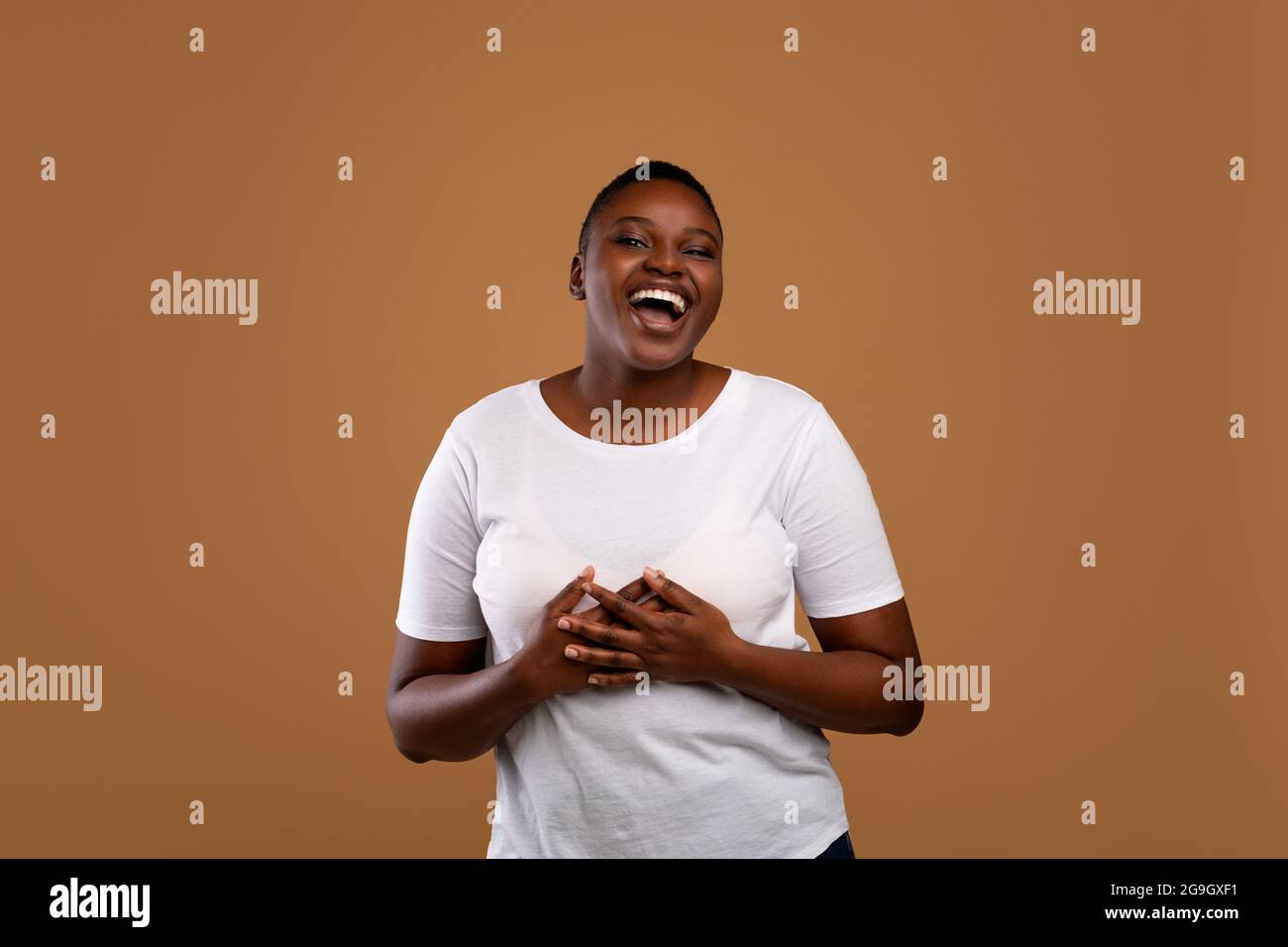 Chubby woman laughing hi-res stock photography and images - Alamy