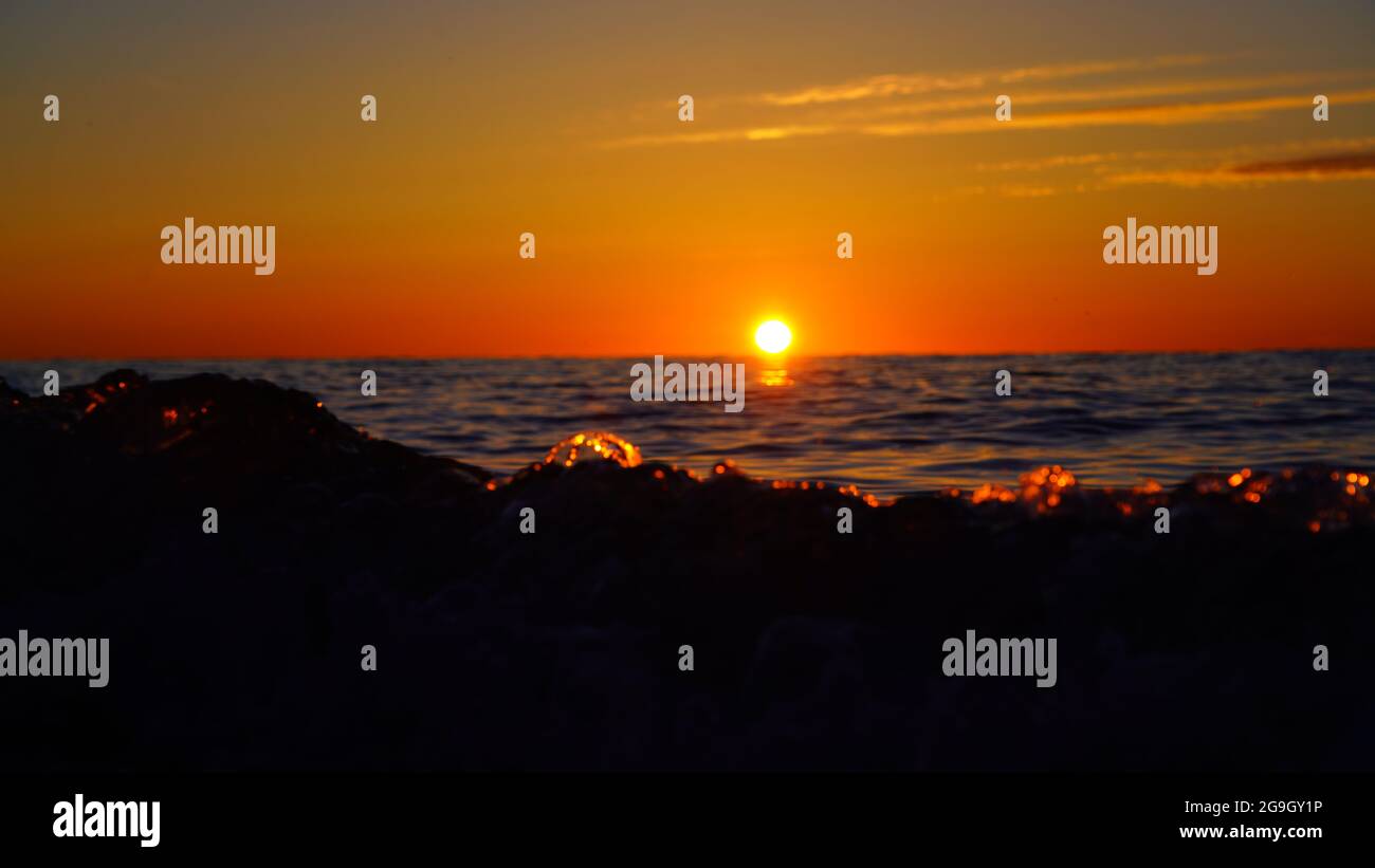 sunset on the Black Sea in June Stock Photo - Alamy