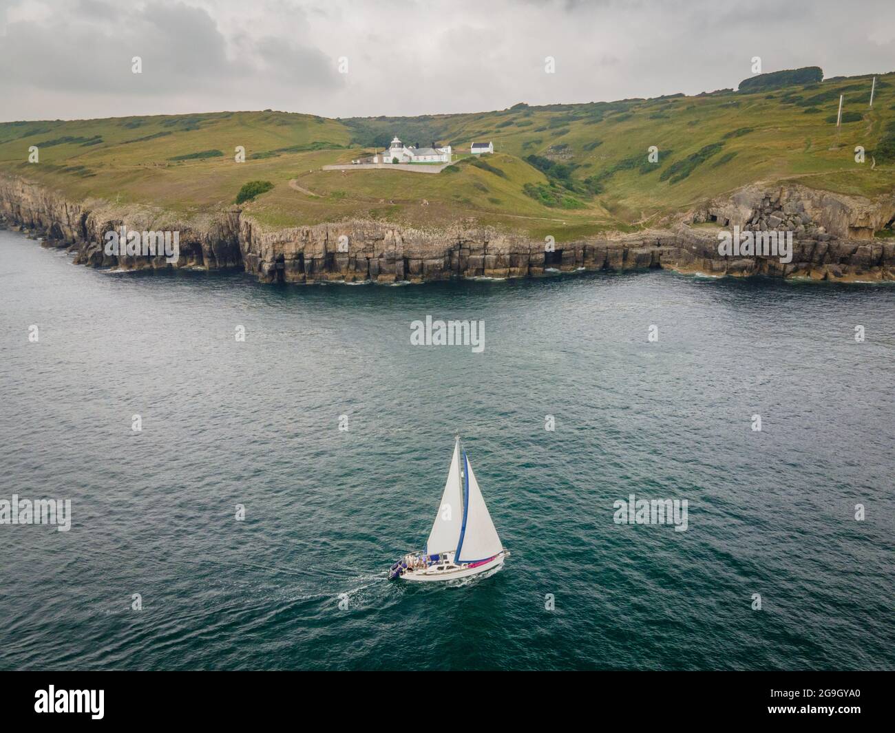 Sail boats sailing along the Jurassic Coast in Devon, South West ...