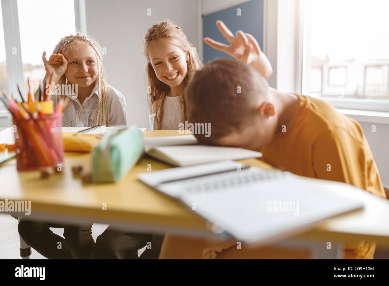 New classmate in classroom hi-res stock photography and images - Alamy