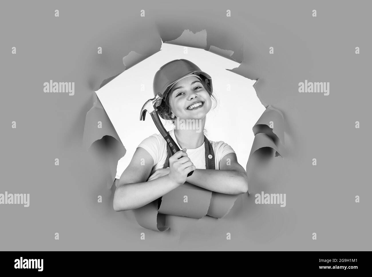 Child care development. Kid engineer with carpenter work hammer. Labor ...