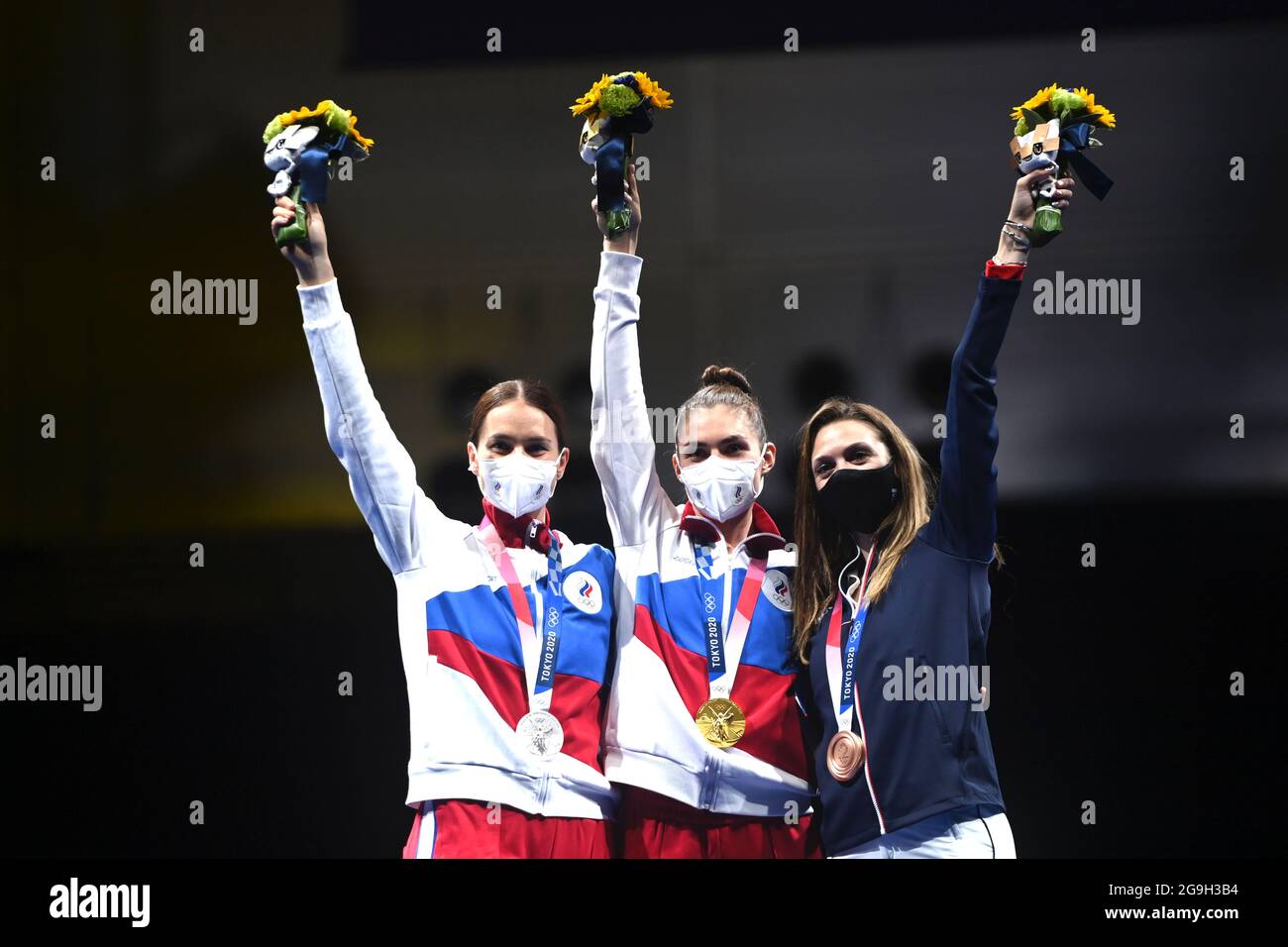 Tokyo, Japan. 26th July, 2021. Sofya Pozdniakova (C) of ROC poses with ...
