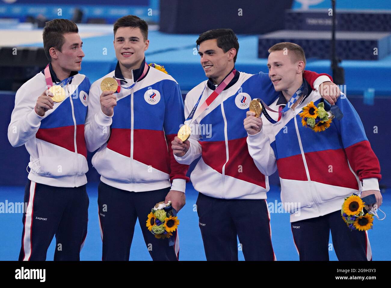 Tokyo, Japan. 26th July, 2021. Russian Olympic Committee gymnasts (L-R ...