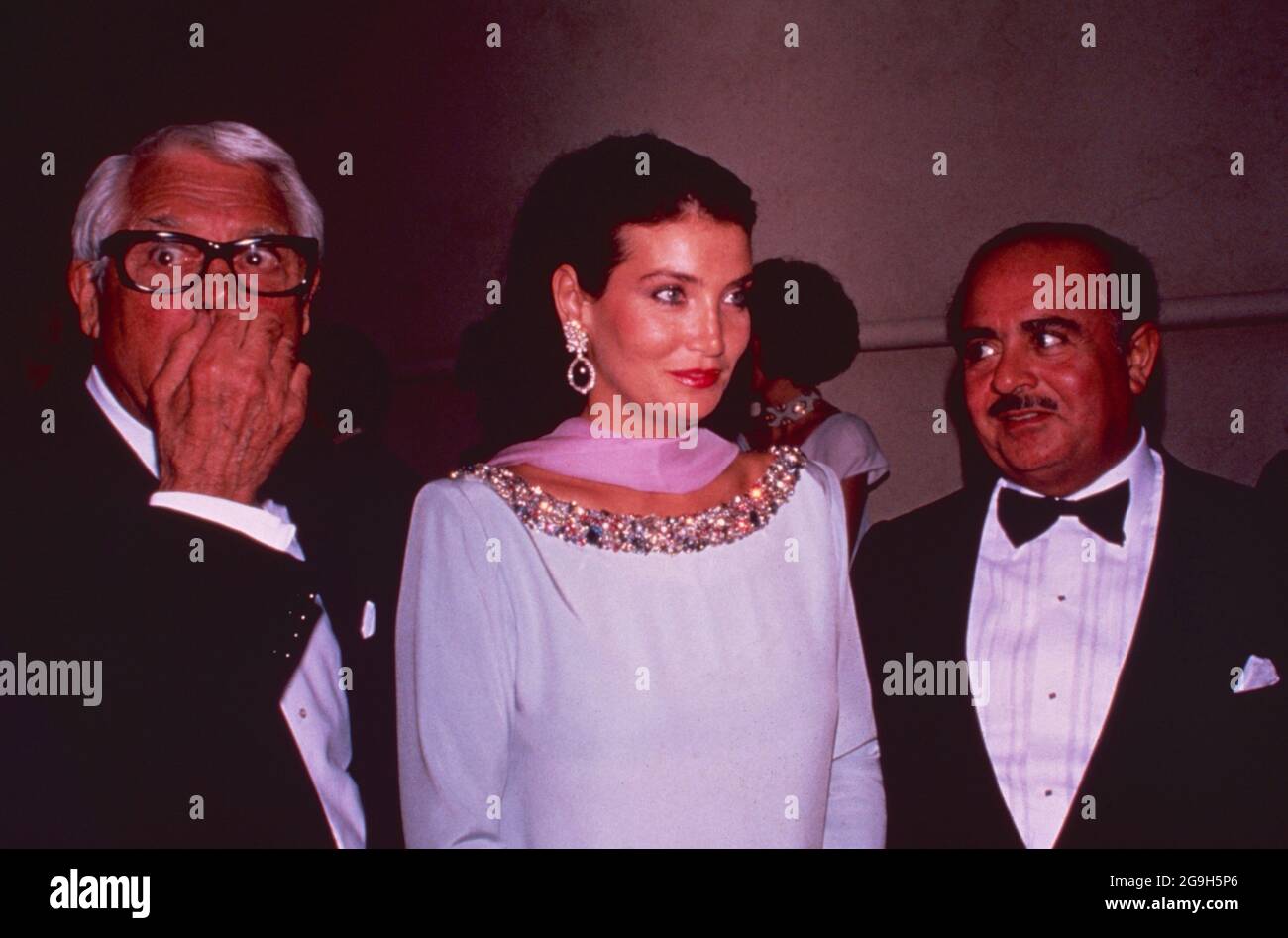 Los Angeles.CA.USA. LIBRARY. Cary Grant with Adnan Khashoggi and his ...