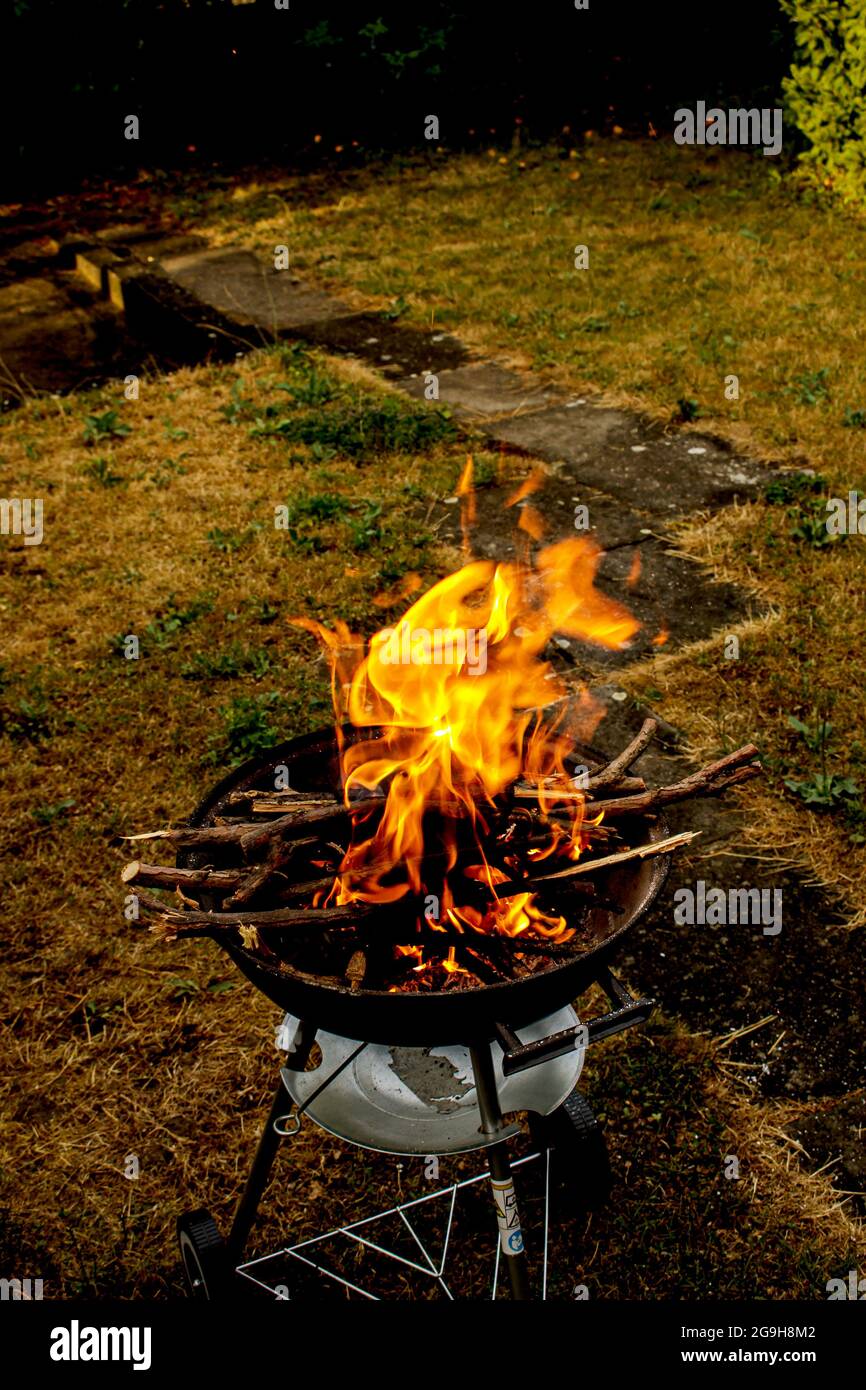 Burning fire, wood, coals for barbecue. Camping BBQ preparation Stock ...