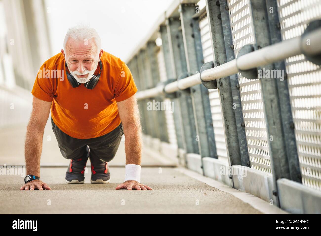Old man doing physical exercises for a better quality of life Stock ...