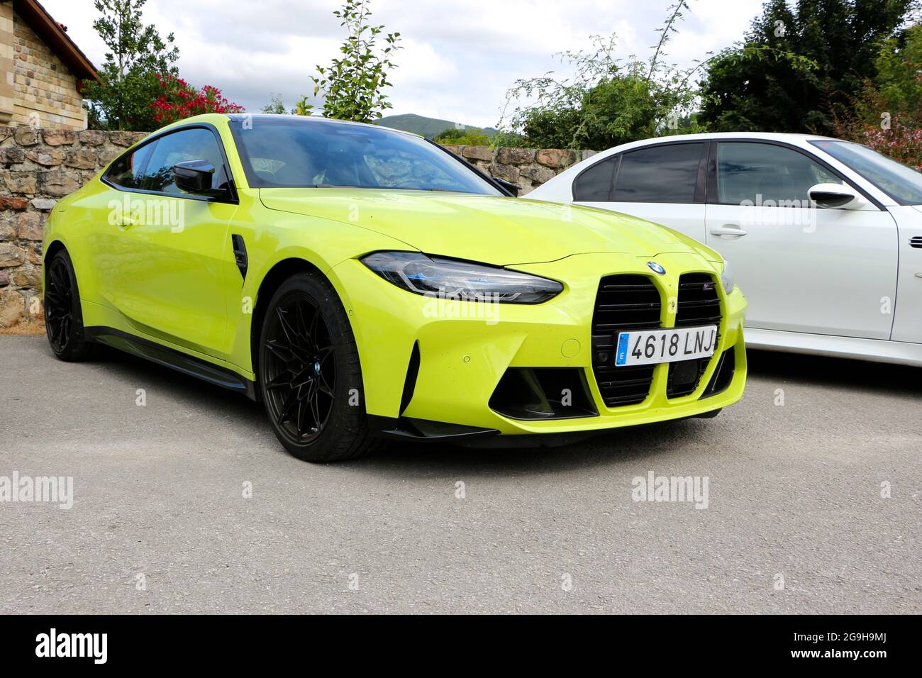 A collection of BMW M performance cars in a car park at an owners club ...