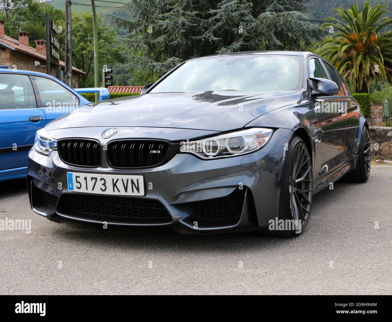A collection of BMW M performance cars in a car park at an owners club ...