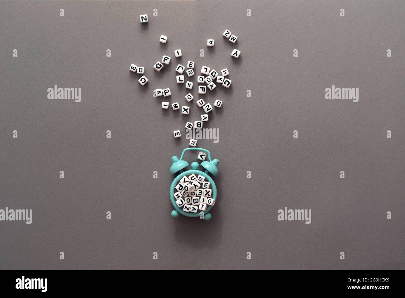 Creative flat lay back to school education concept with alarm clock and ...