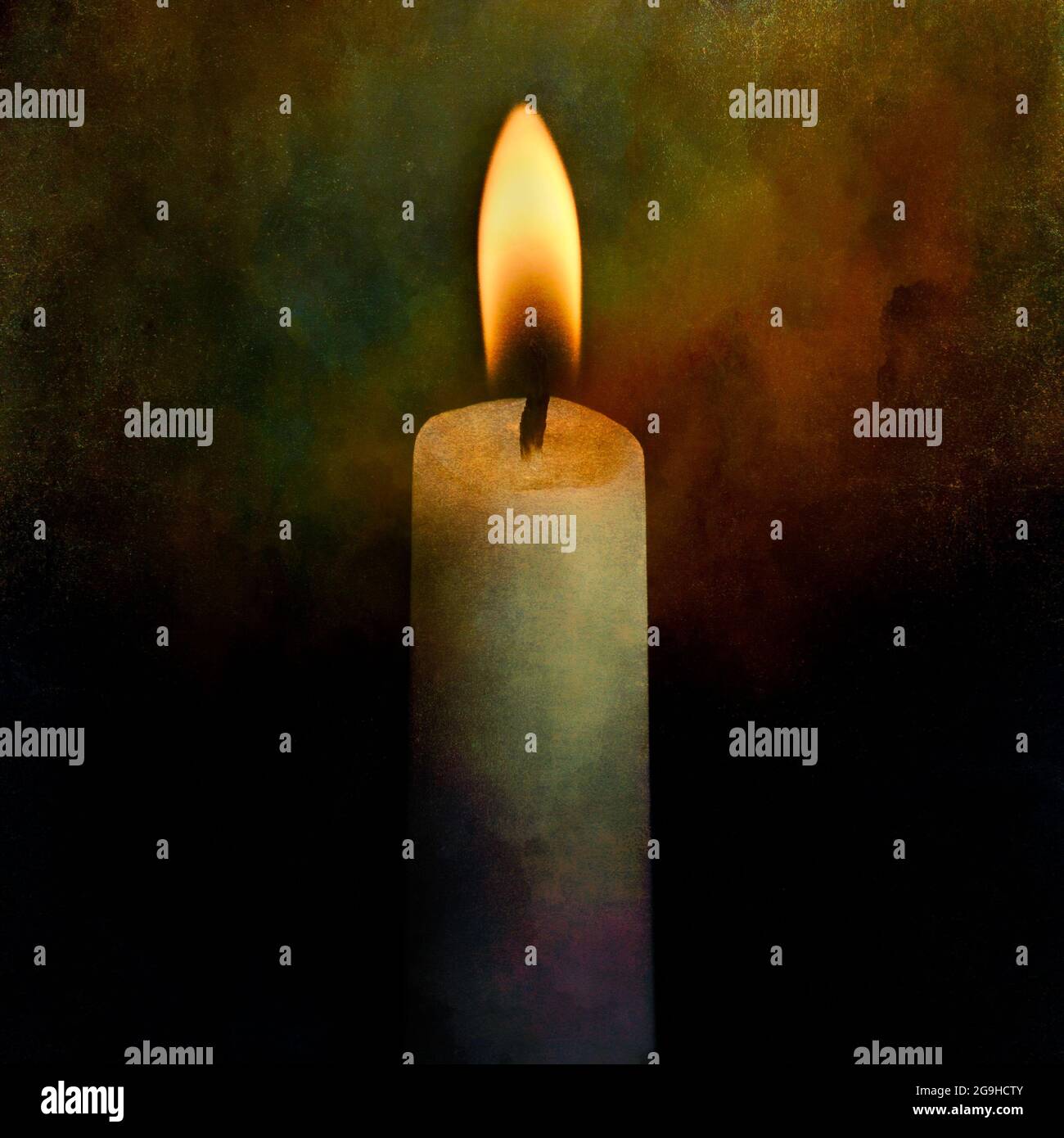 A single lit candle on a smokey textured background creating a ...
