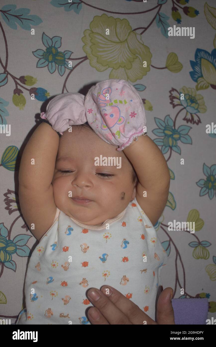 Cute Indian baby girl sleeping Stock Photo - Alamy
