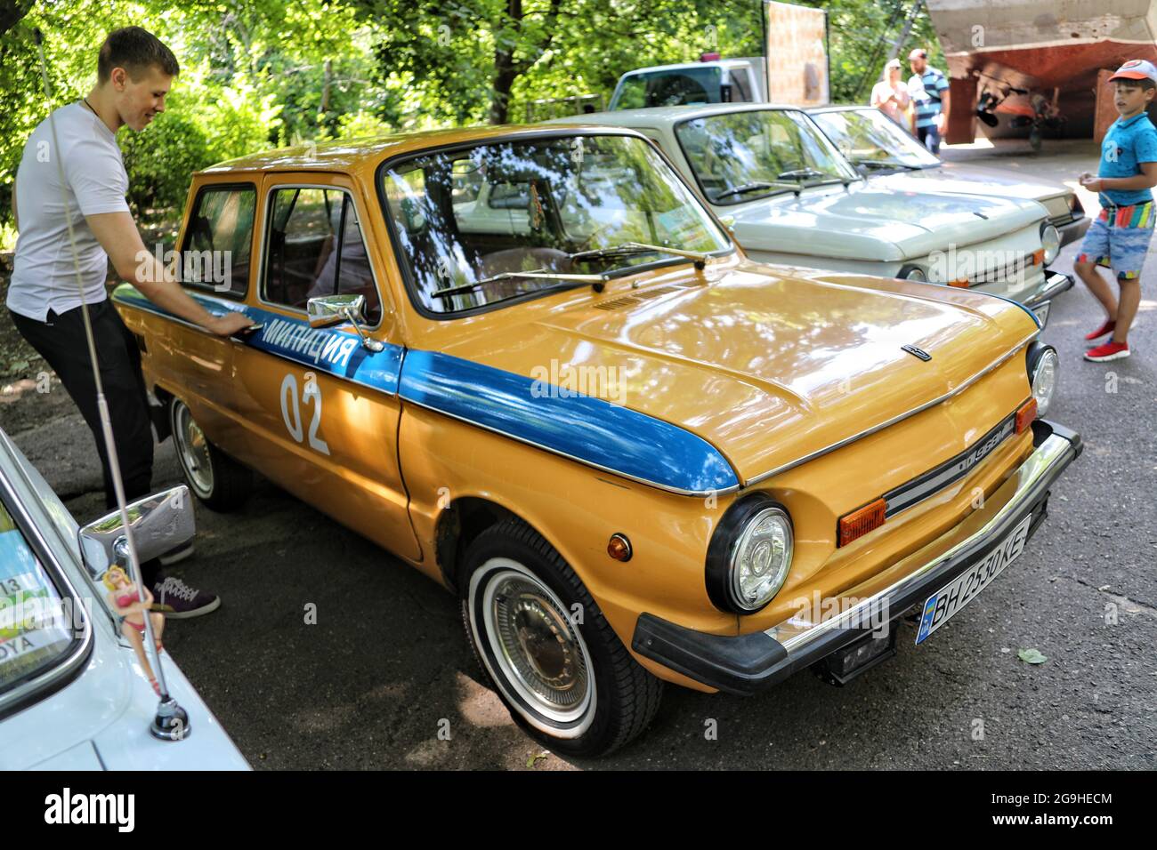 ODESA, UKRAINE - JULY 24, 2021 - A young man holds a handle of a Soviet ...