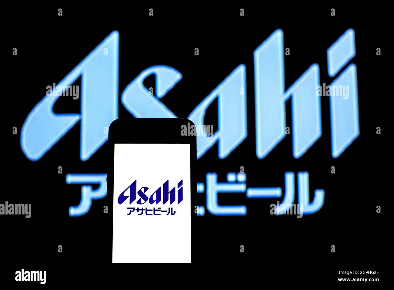 In this photo illustration an Asahi Breweries logo seen displayed on a ...