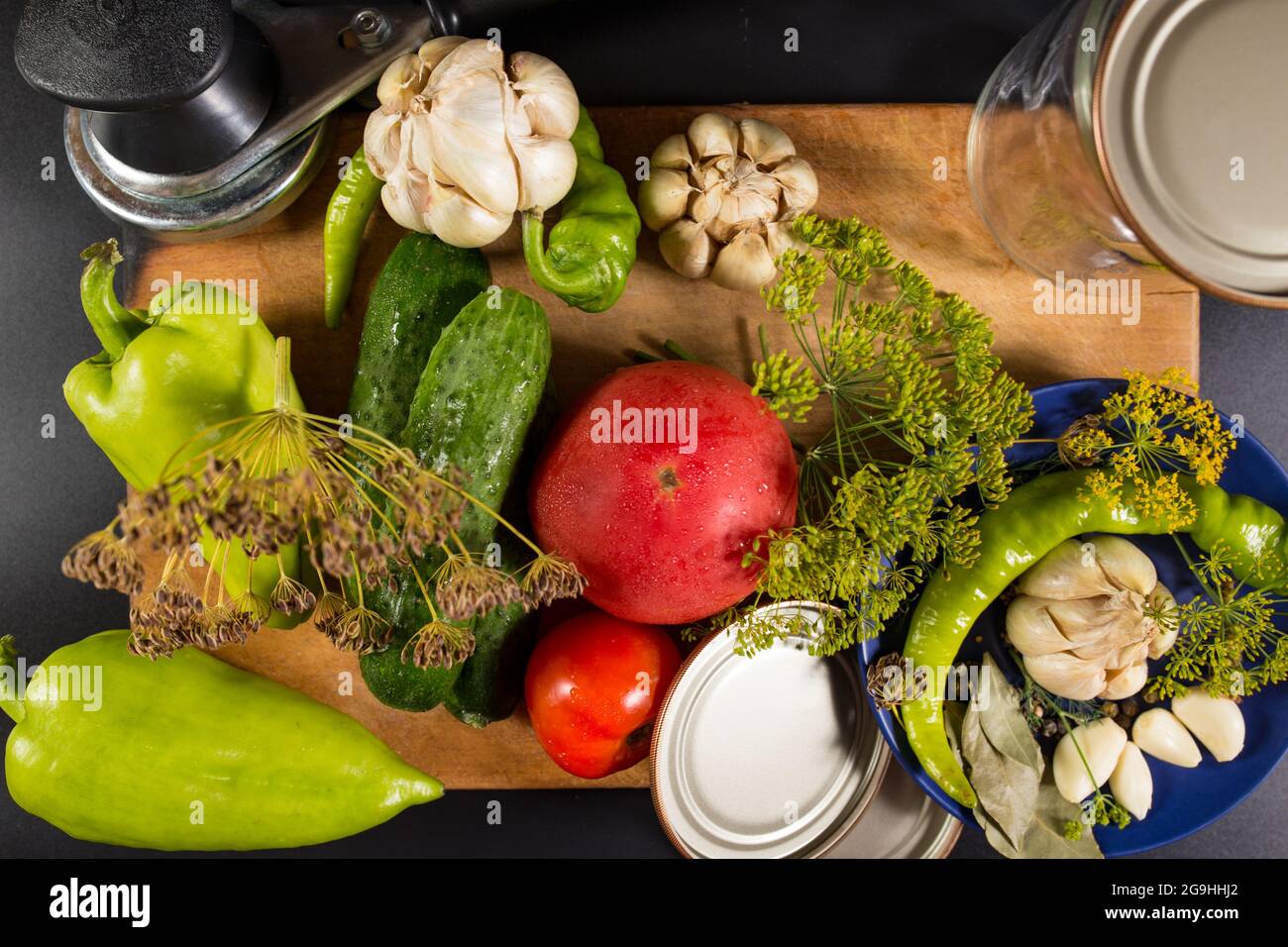 Herbs andspices for pickling vegetables on a wooden kitchen board Stock ...