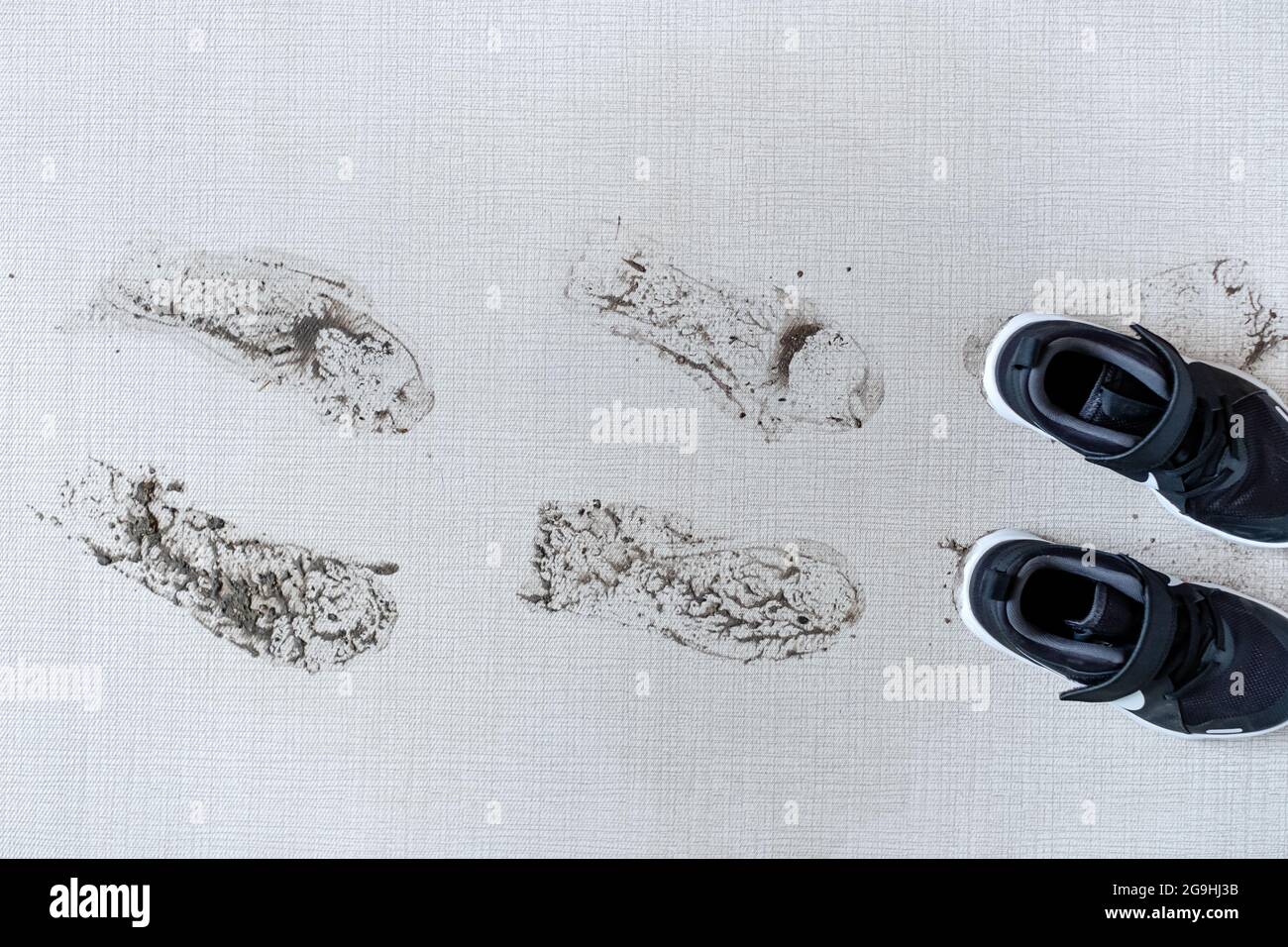 Muddy footprints on carpet hi-res stock photography and images - Alamy