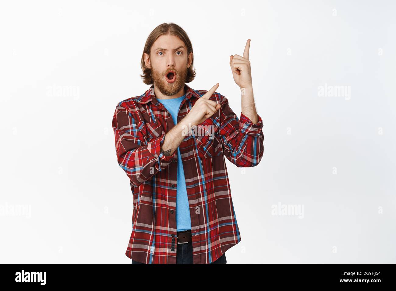 Surprised blond bearded man drop jaw, wow face, gasping impressed and ...