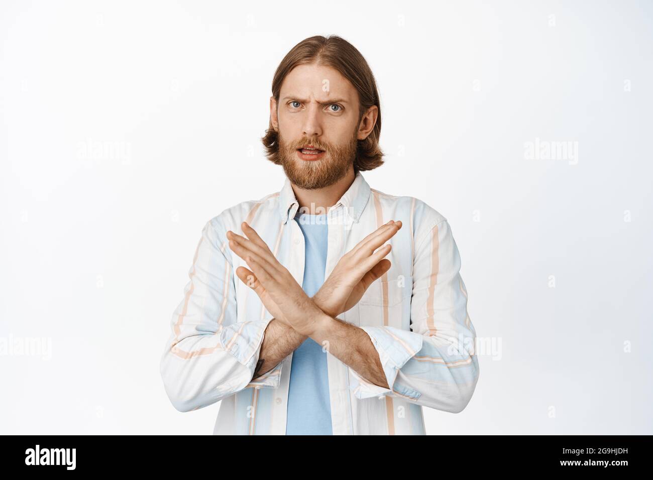 Handsome young man shaking head hi-res stock photography and images - Alamy