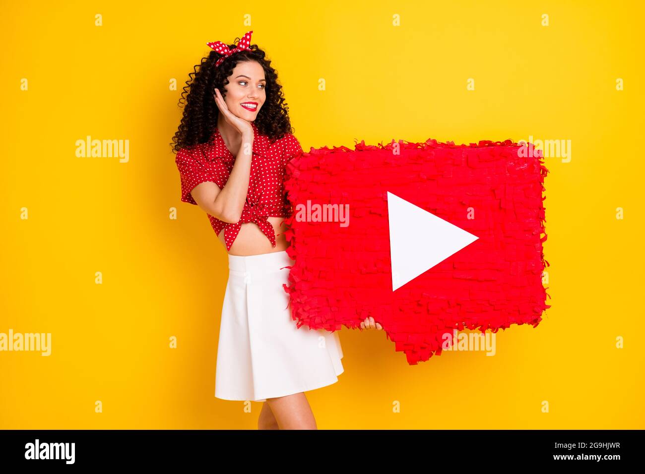 Photo of cute optimistic brunette hair lady hold look pinata wear red ...
