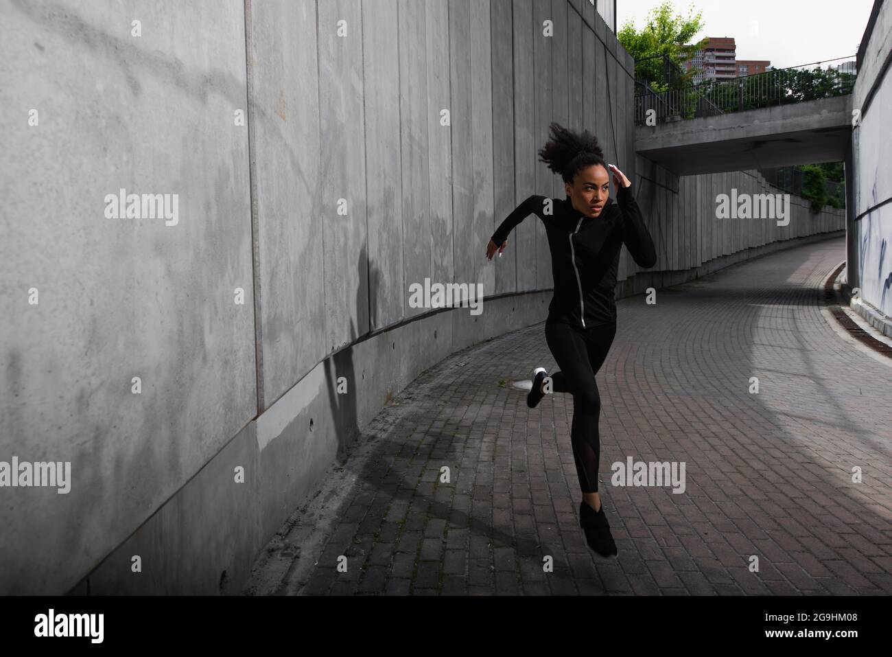 African woman runner focused hi-res stock photography and images - Alamy